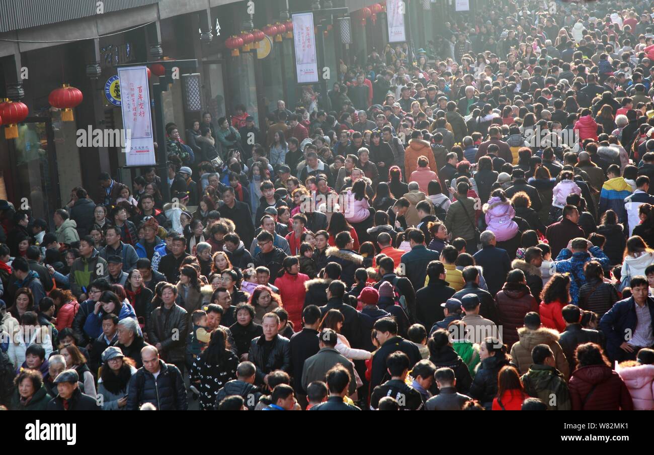 Tourists crowd the Confucius Temple to celebrate the Chinese Lunar New Year, also known as ...