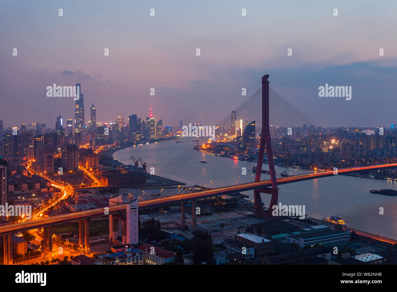 --FILE--Night view of the Yangpu Bridge over Huangpu River in Shanghai ...