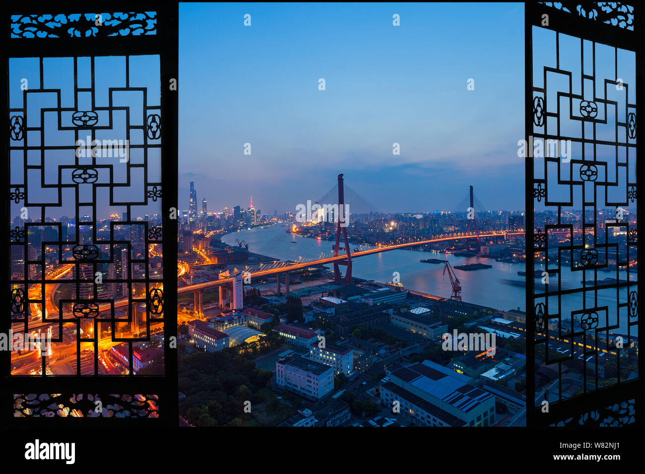 --FILE--Night view of the Yangpu Bridge over Huangpu River in Shanghai ...