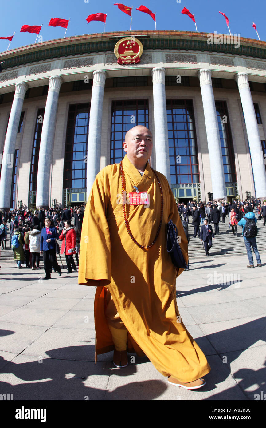 --FILE--Shi Yongxin, abbot of Shaolin Temple, exits from the Great Hall ...