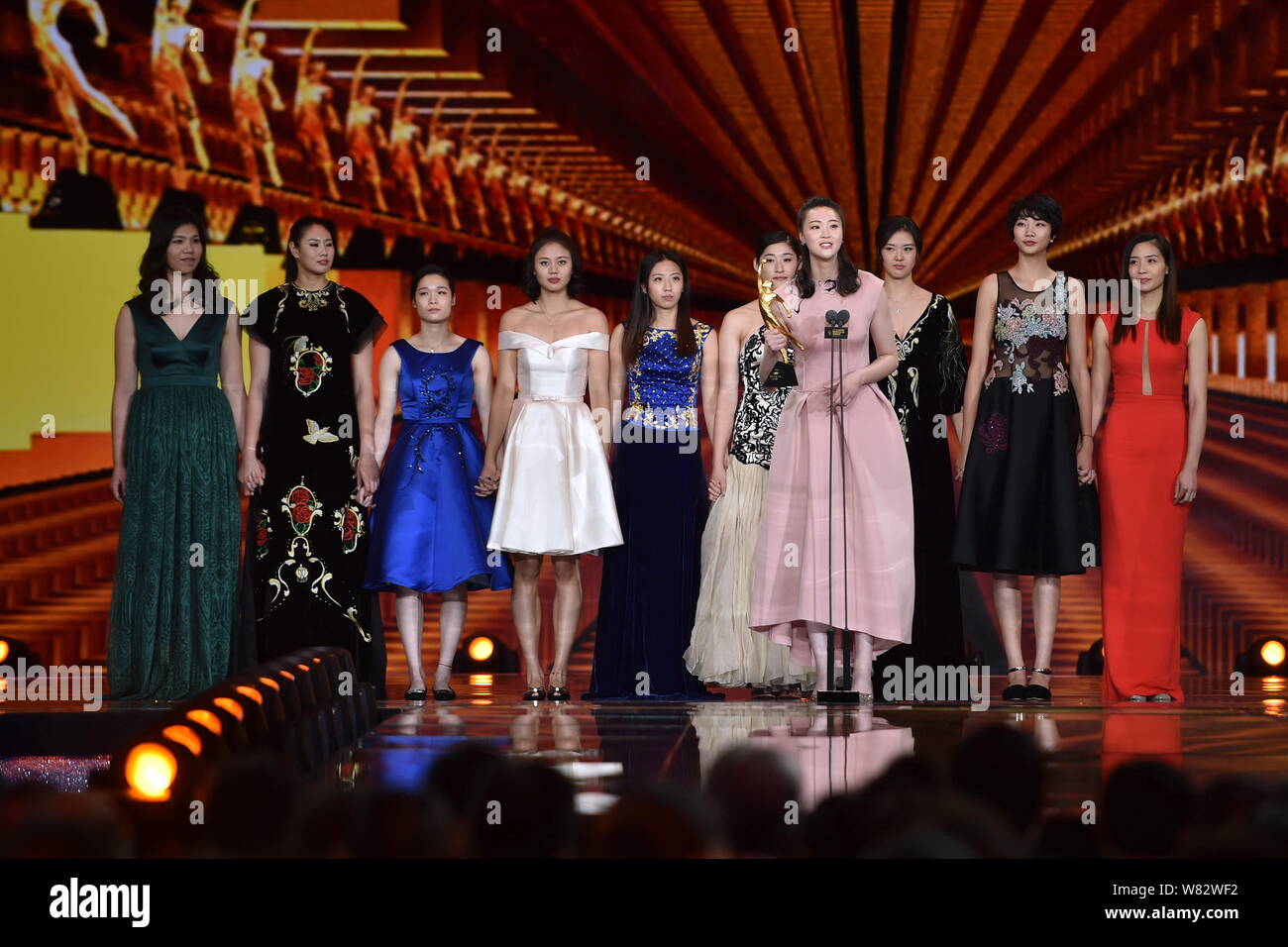Members of the Chinese national women's volleyball team pose with their ...