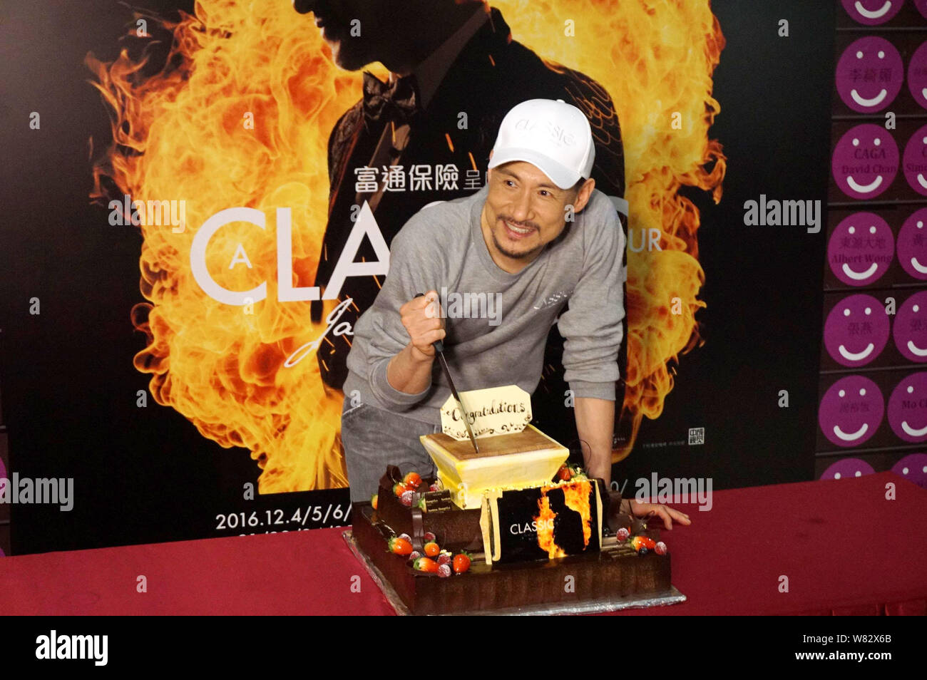 Hong Kong singer Jacky Cheung poses at a celebration party for his "A ...