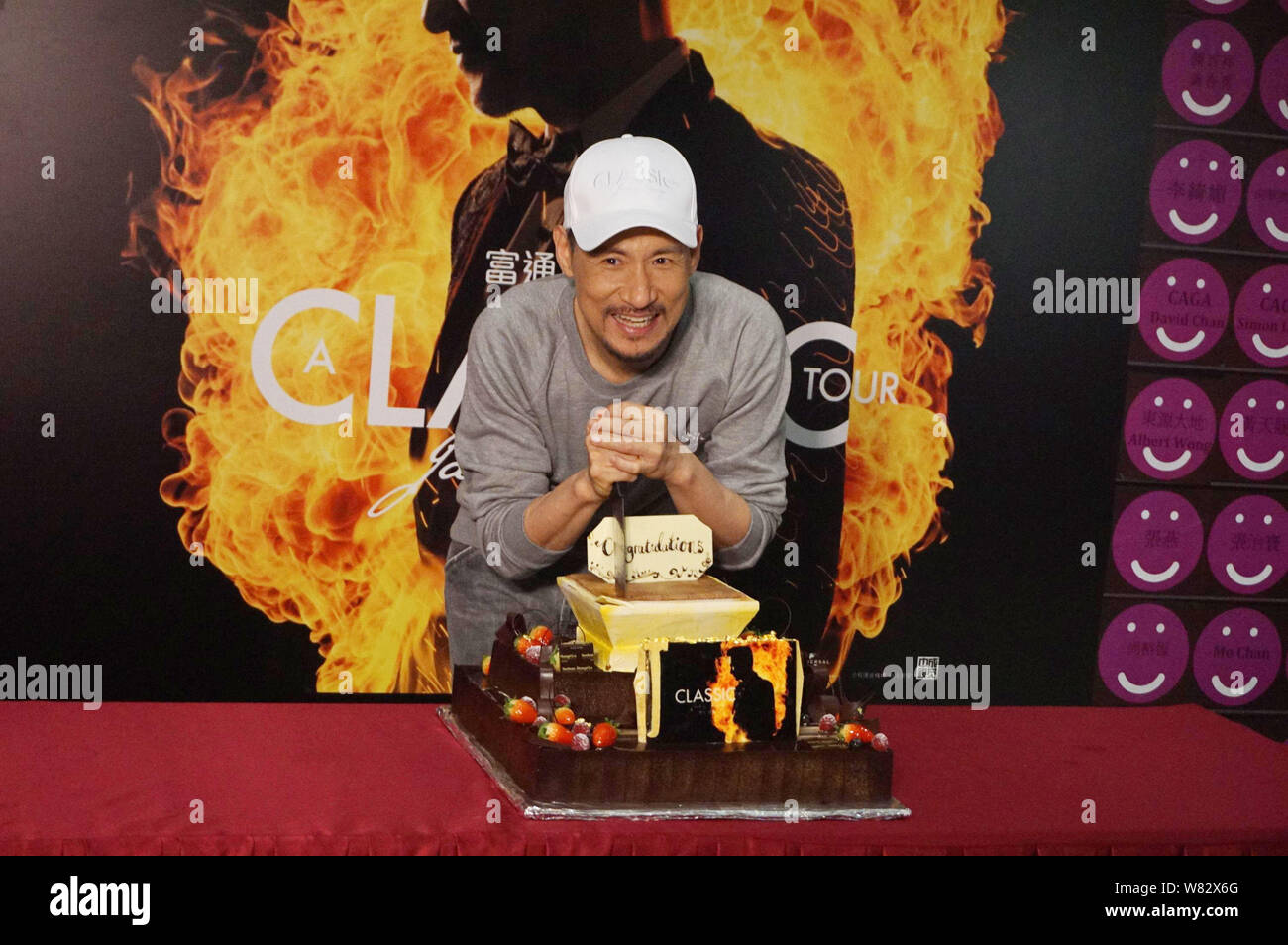 Hong Kong singer Jacky Cheung poses at a celebration party for his "A ...