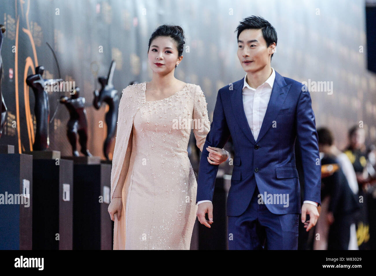Chinese diving couple Qin Kai, right, and He Zi arrive at the red ...