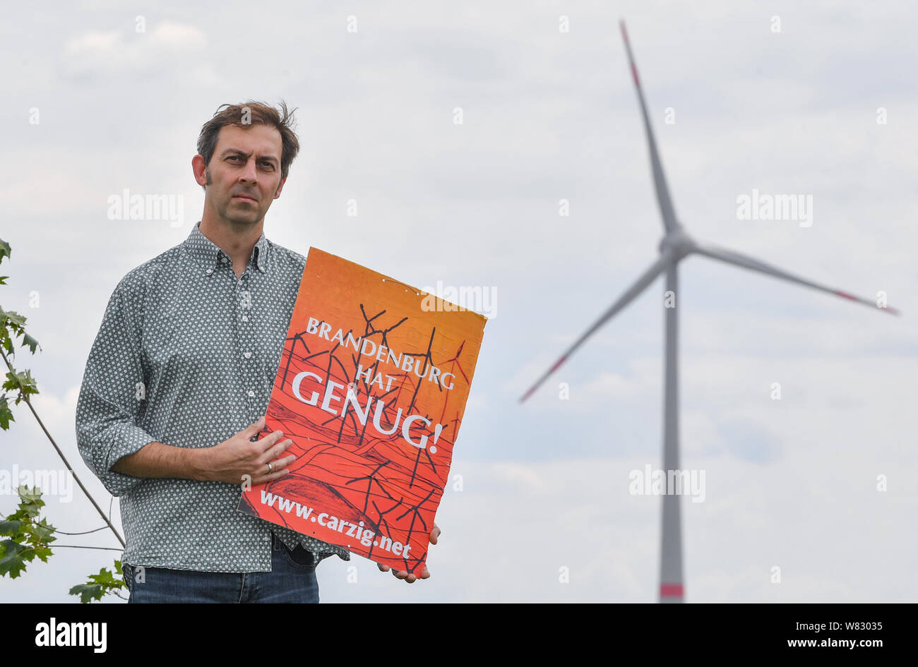 Carzig, Germany. 04th Aug, 2019. Stefan Hellert, owner of his own home ...