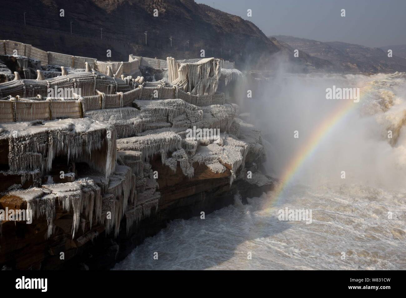 View of the Hukou Waterfall on the Yellow River with glorious rainbow ...