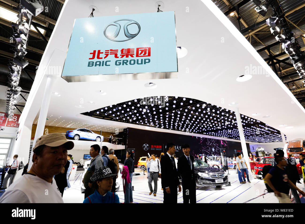 --FILE--People visit the stand of BAIC Group during the 14th Beijing ...