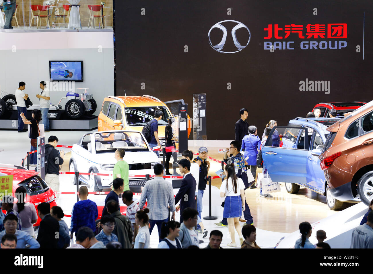 --FILE--People visit the stand of BAIC Group during the 14th Beijing ...