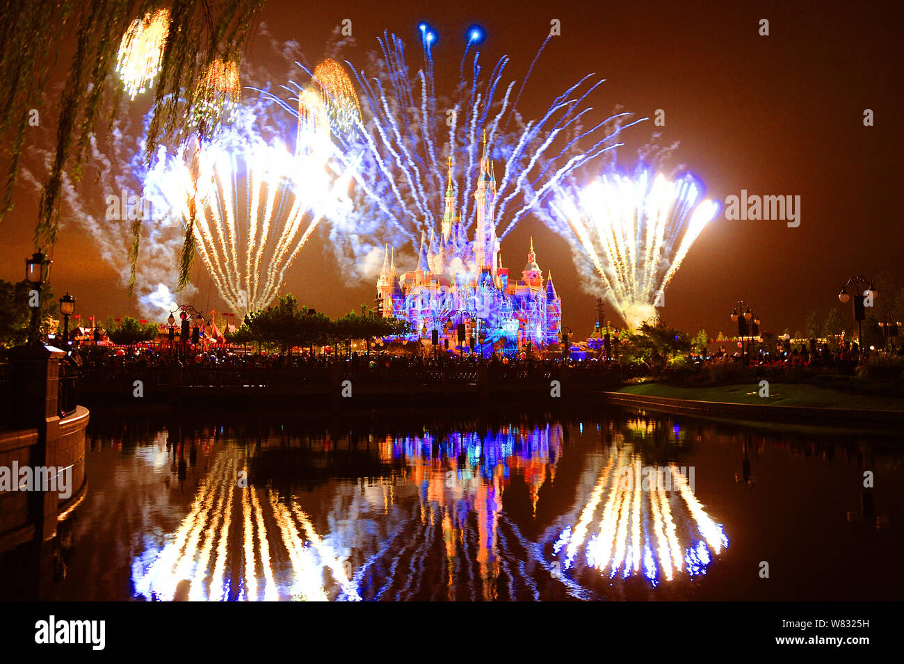 --FILE--Fireworks explode over the Disney Castle in the Shanghai ...