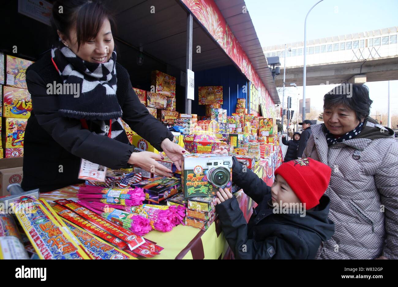 Local Chinese residents buy fireworks for the upcoming Spring Festival ...