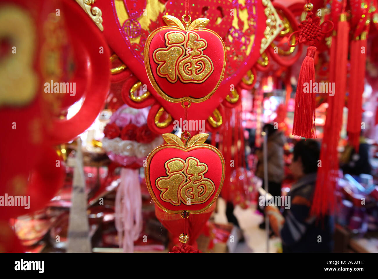 Local Chinese residents shop for red lanterns, decals and other ...