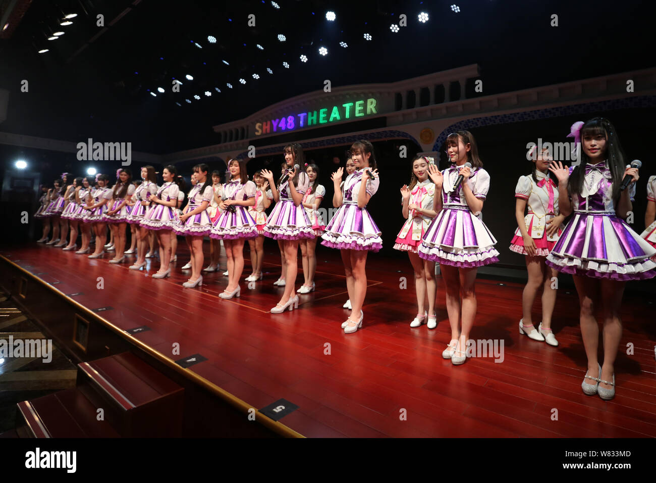 Members of Chinese girl group SHY48 attend a press conference to ...