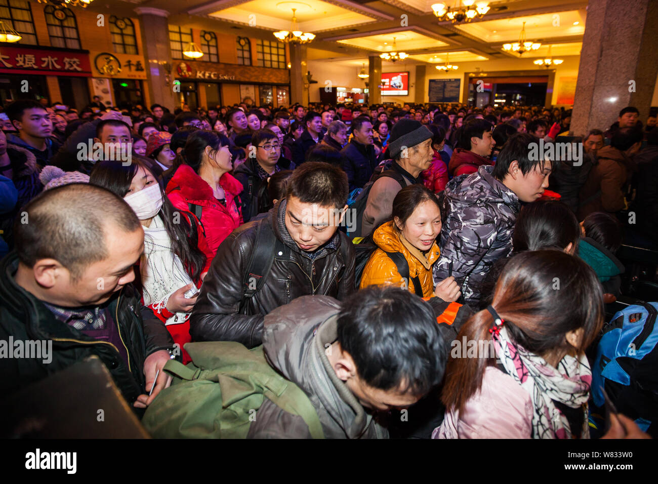 Passengers who go back home for the upcoming Chinese Lunar New Year ...