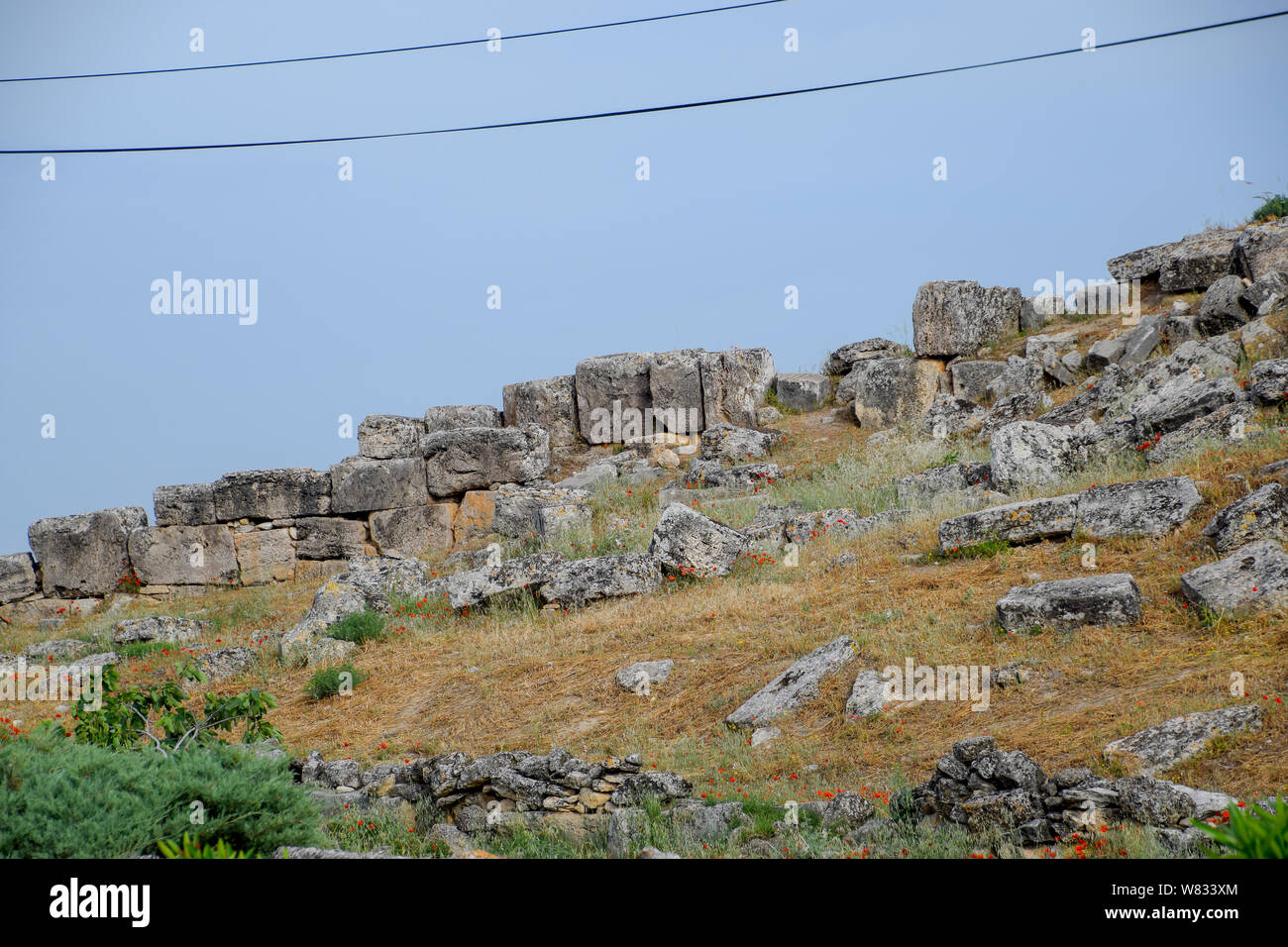 Limestone blocks an earthquake-destroyed wall of the city of Hierapolis ...