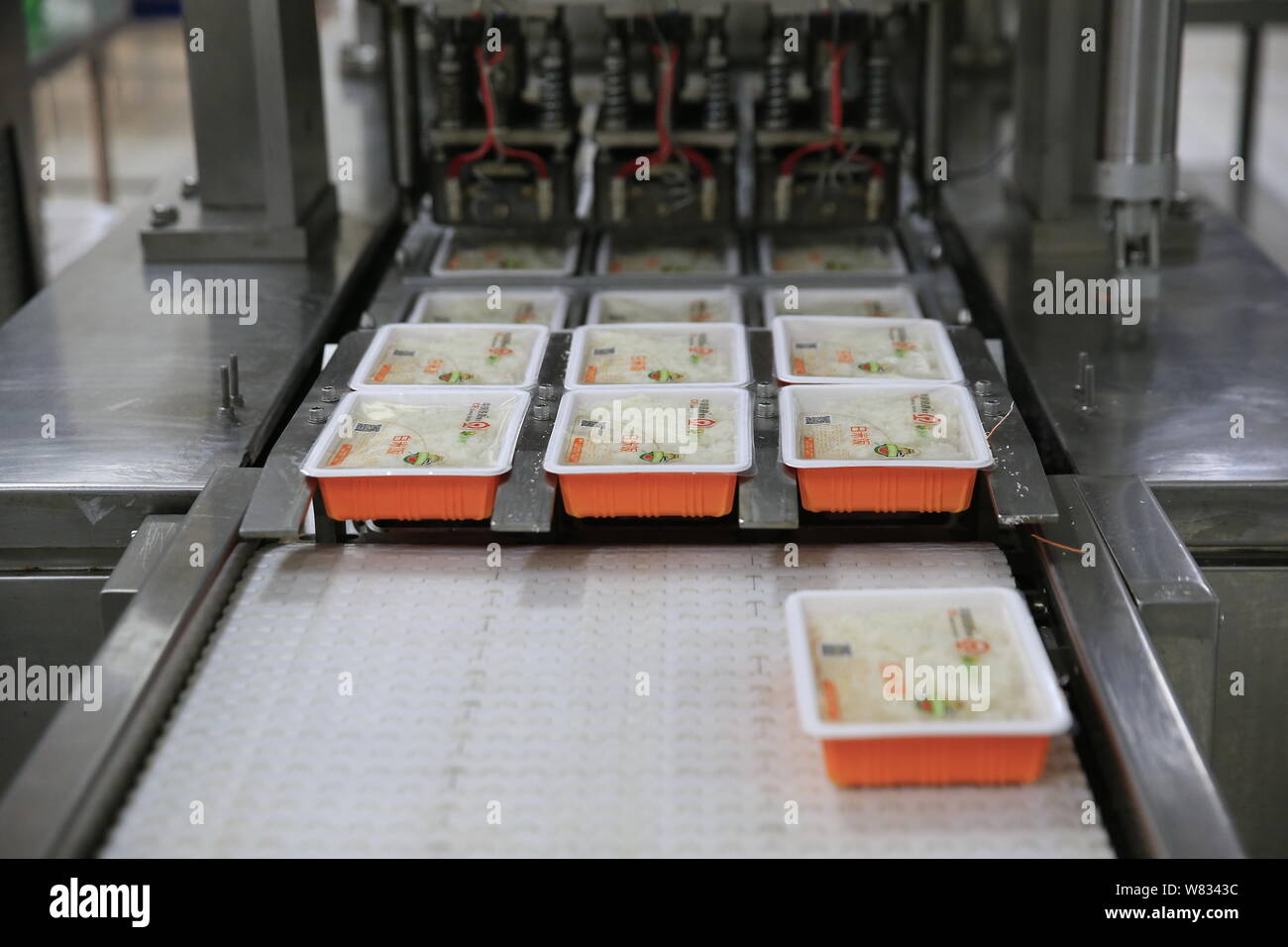 Production line boxes hi-res stock photography and images - Alamy