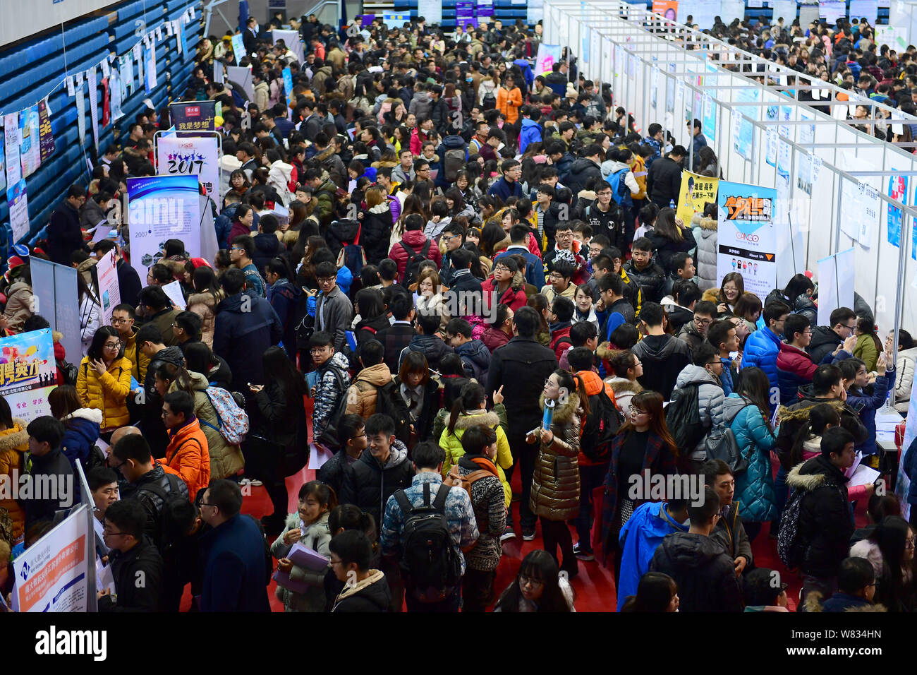--FILE--Chinese students crowd booths to seek for employments during a ...