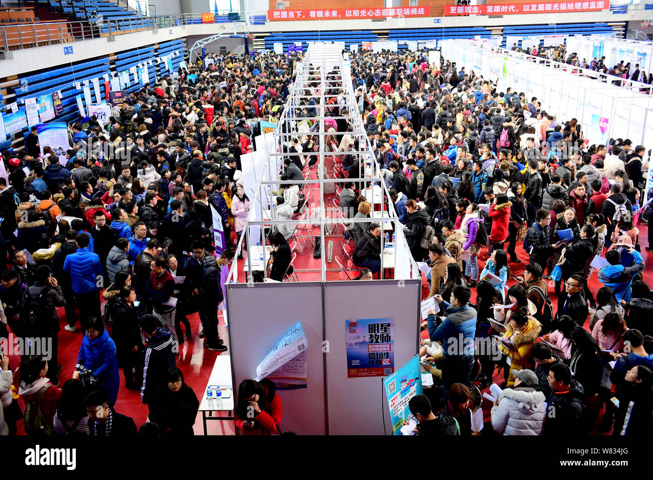 --FILE--Chinese students crowd booths to seek for employments during a ...