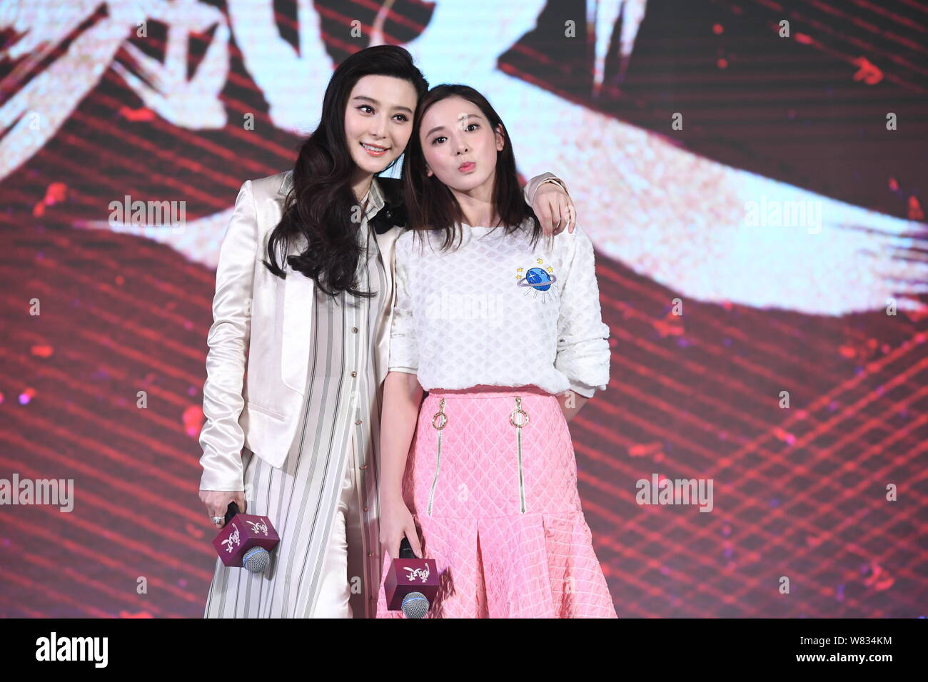 Chinese actresses Fan Bingbing, left, and Peng Xiaoran attend a press ...