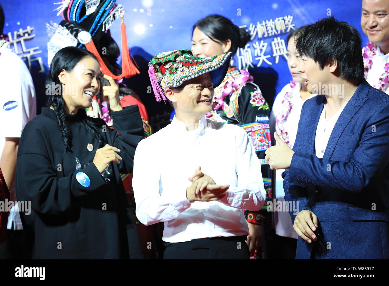 (From left) Chinese singer Na Ying, Jack Ma Yun, Chairman of Alibaba ...
