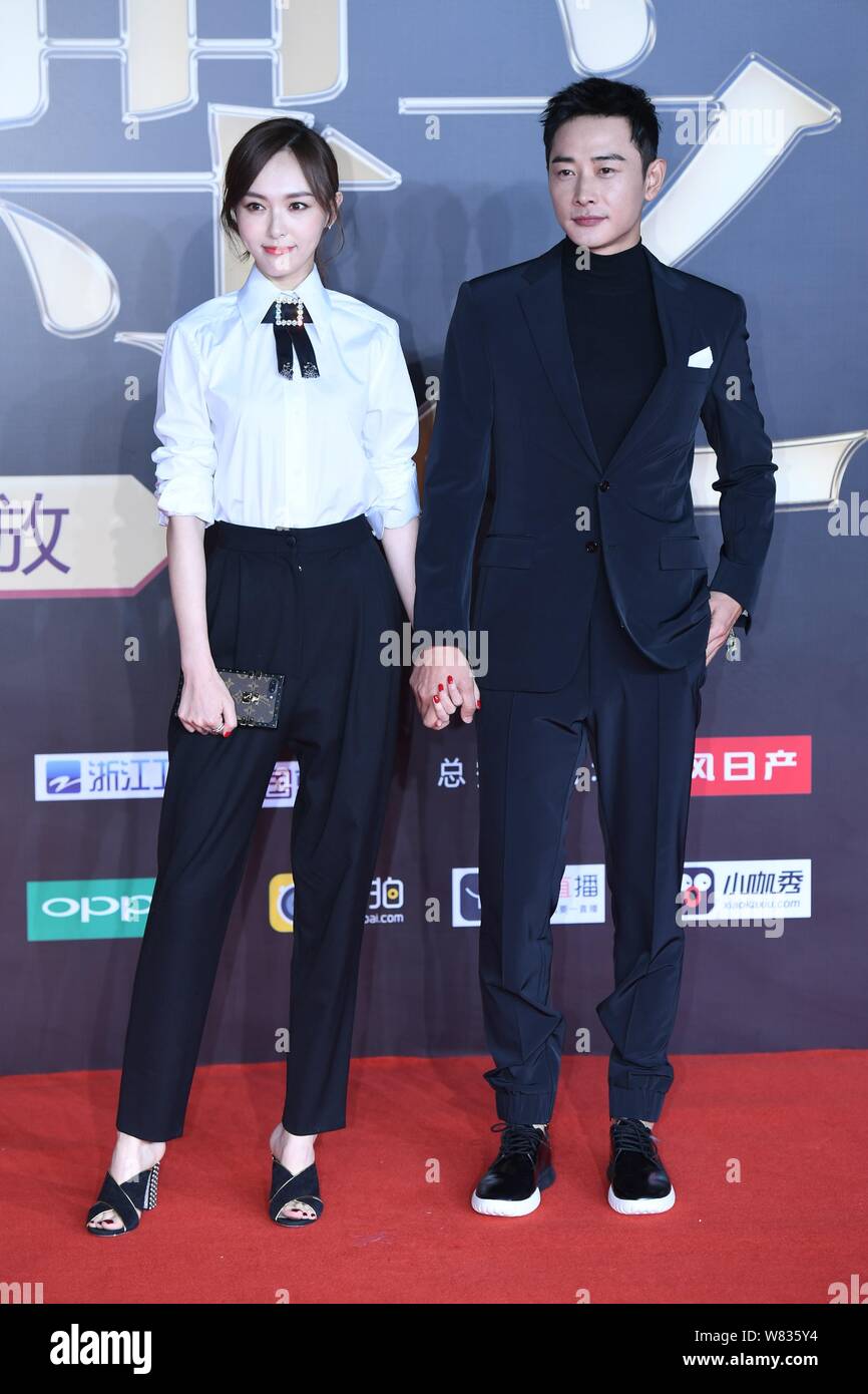 Chinese actress Tang Yan, left, and her actor boyfriend Luo Jin arrive on the red carpet for the ...