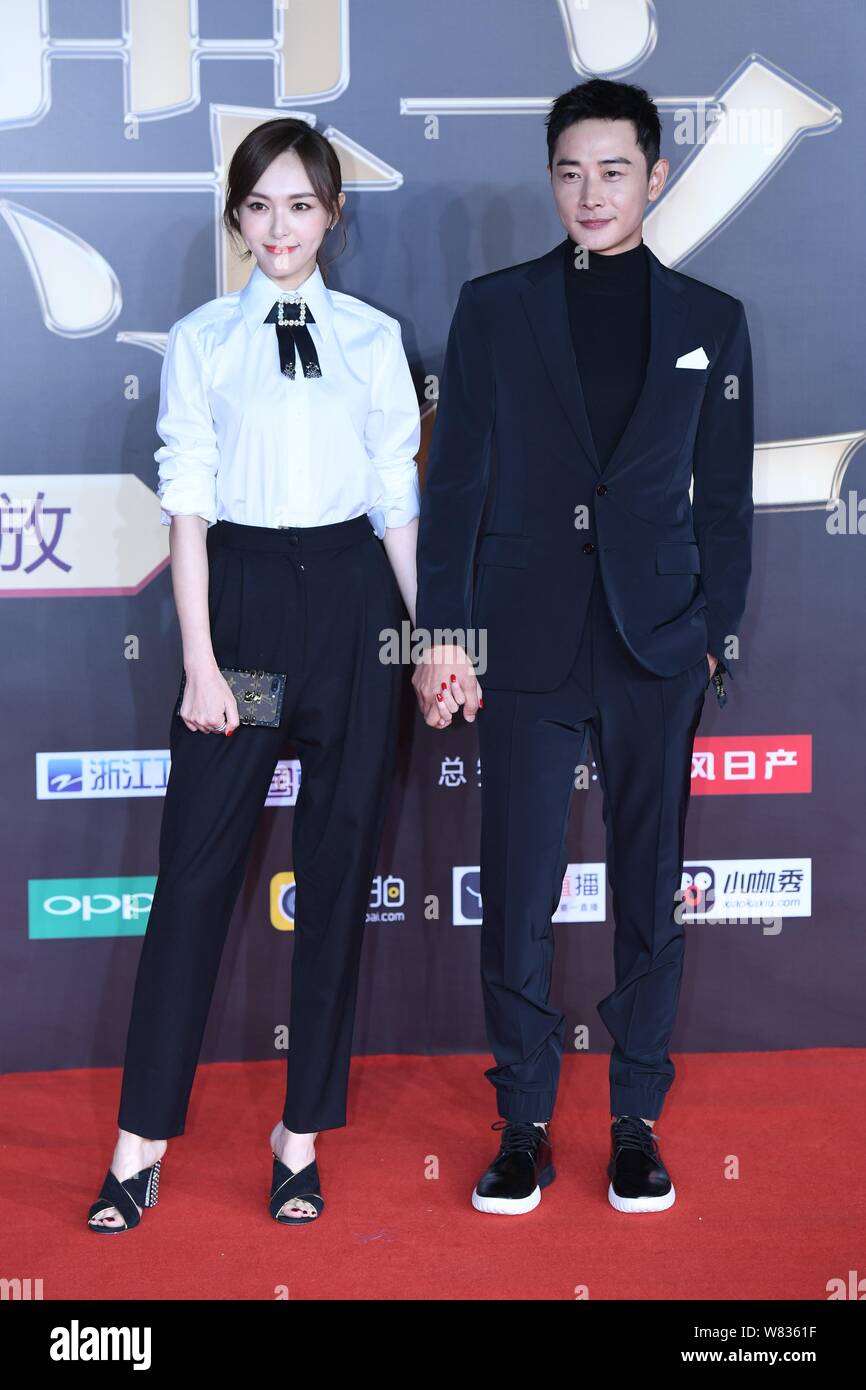 Chinese actress Tang Yan, left, and her actor boyfriend Luo Jin arrive ...