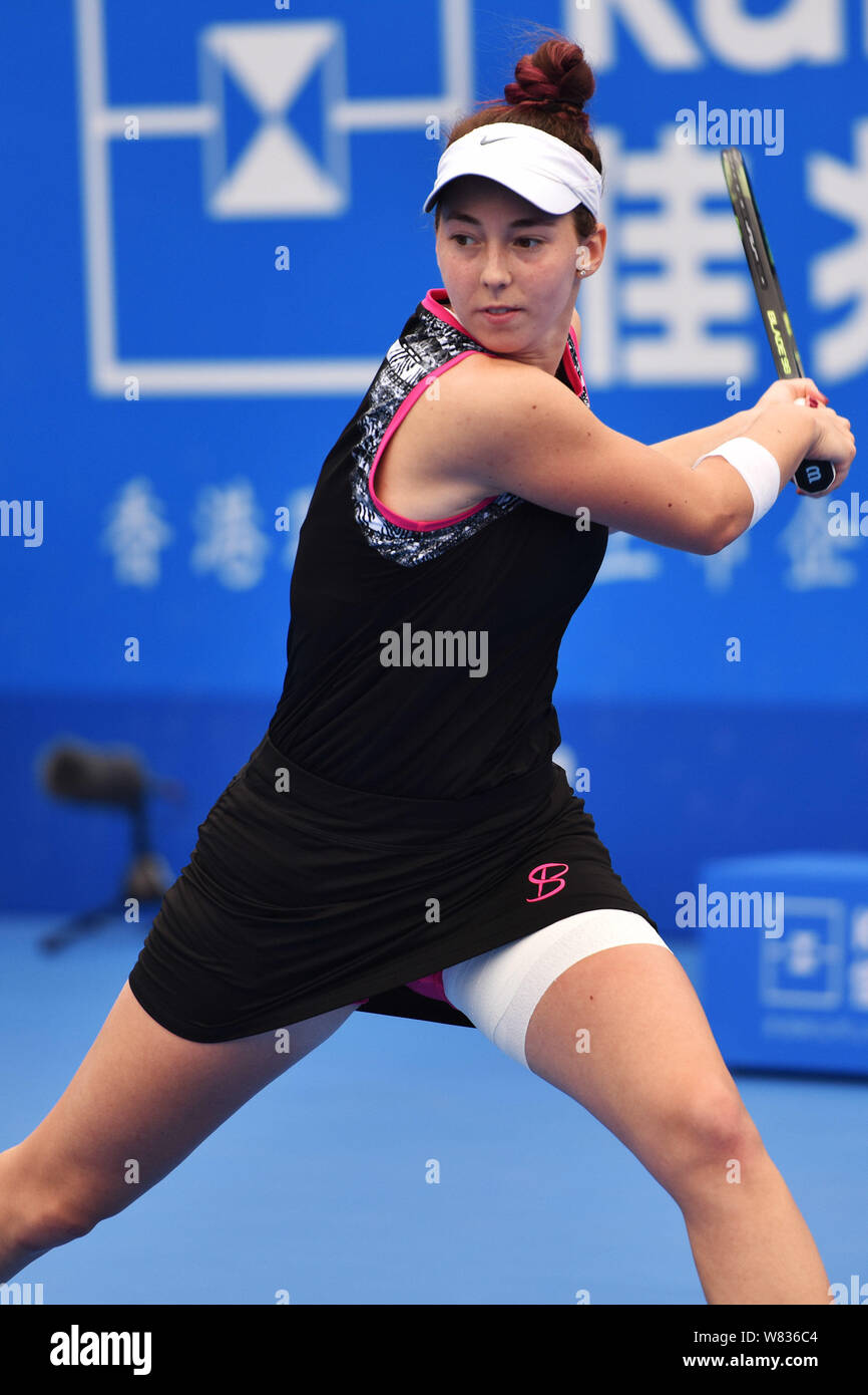 Nina Stojanovic of Serbia returns a shot to Katerina Siniakova of Czech ...