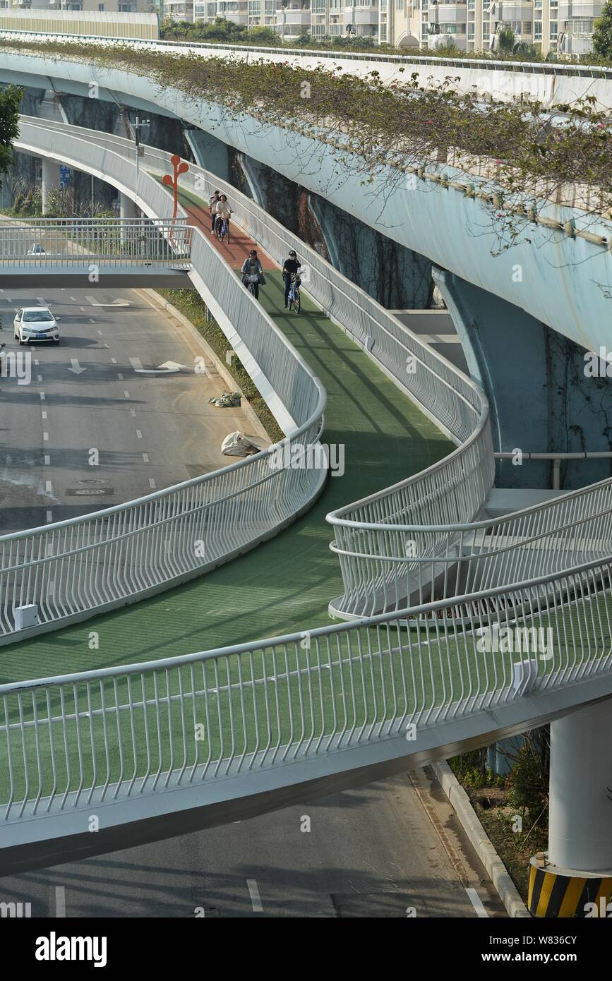 Cyclists ride on China's first elevated bicycle track constructed above ...