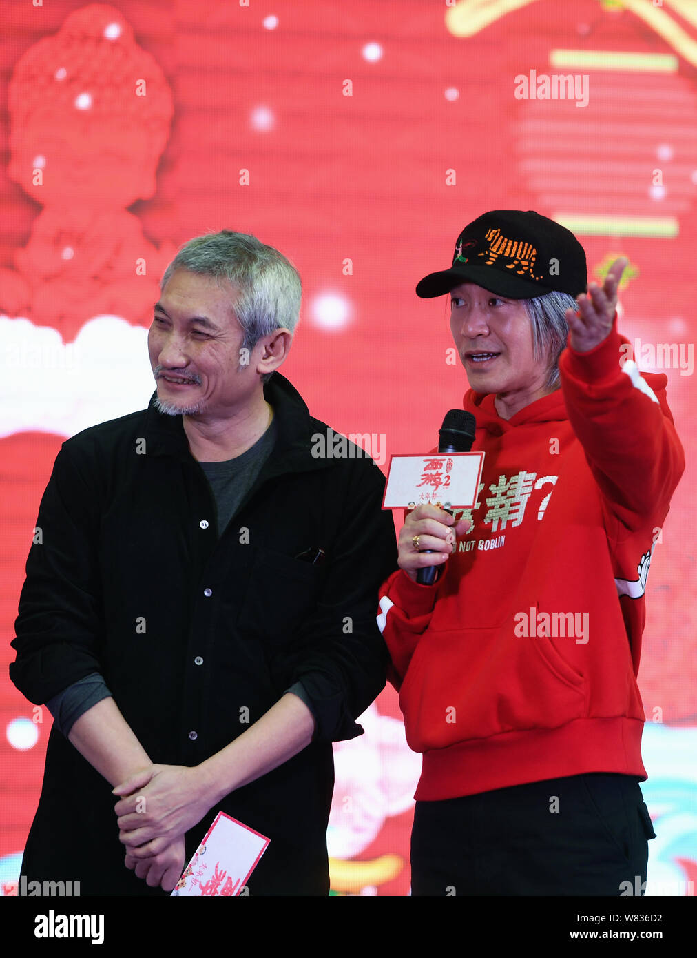 Hong Kong actor Stephen Chow, right, and Hong Kong director Tsui Hark ...