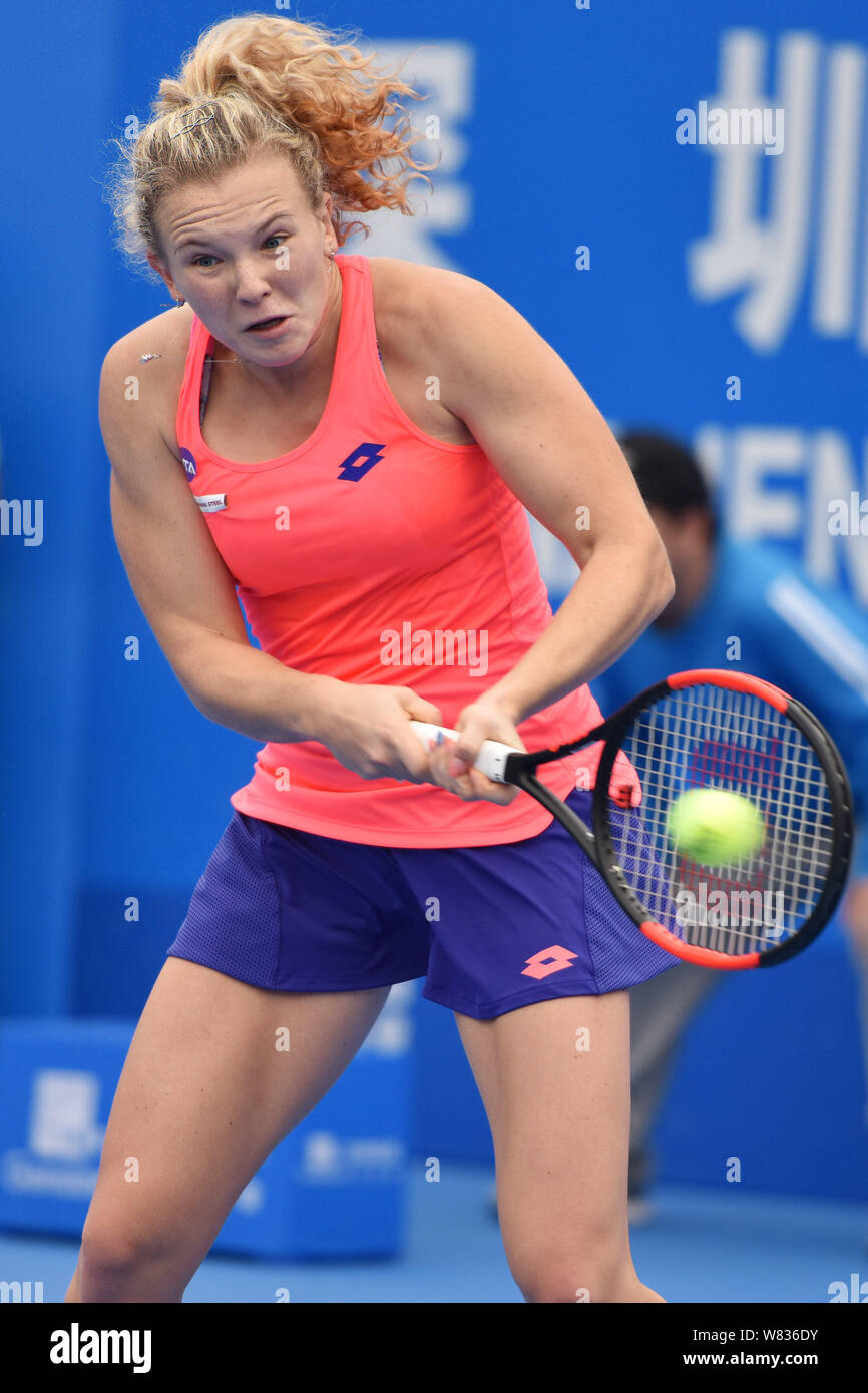 Katerina Siniakova of Czech Republic returns a shot to Nina Stojanovic ...