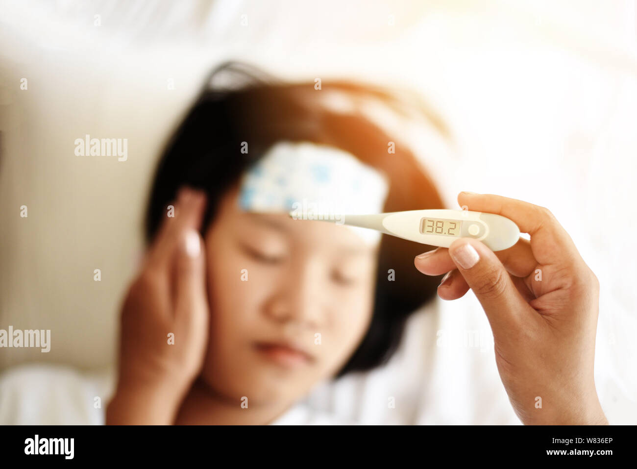 fever child with thermometer measuring temperature of kid sick / child ...