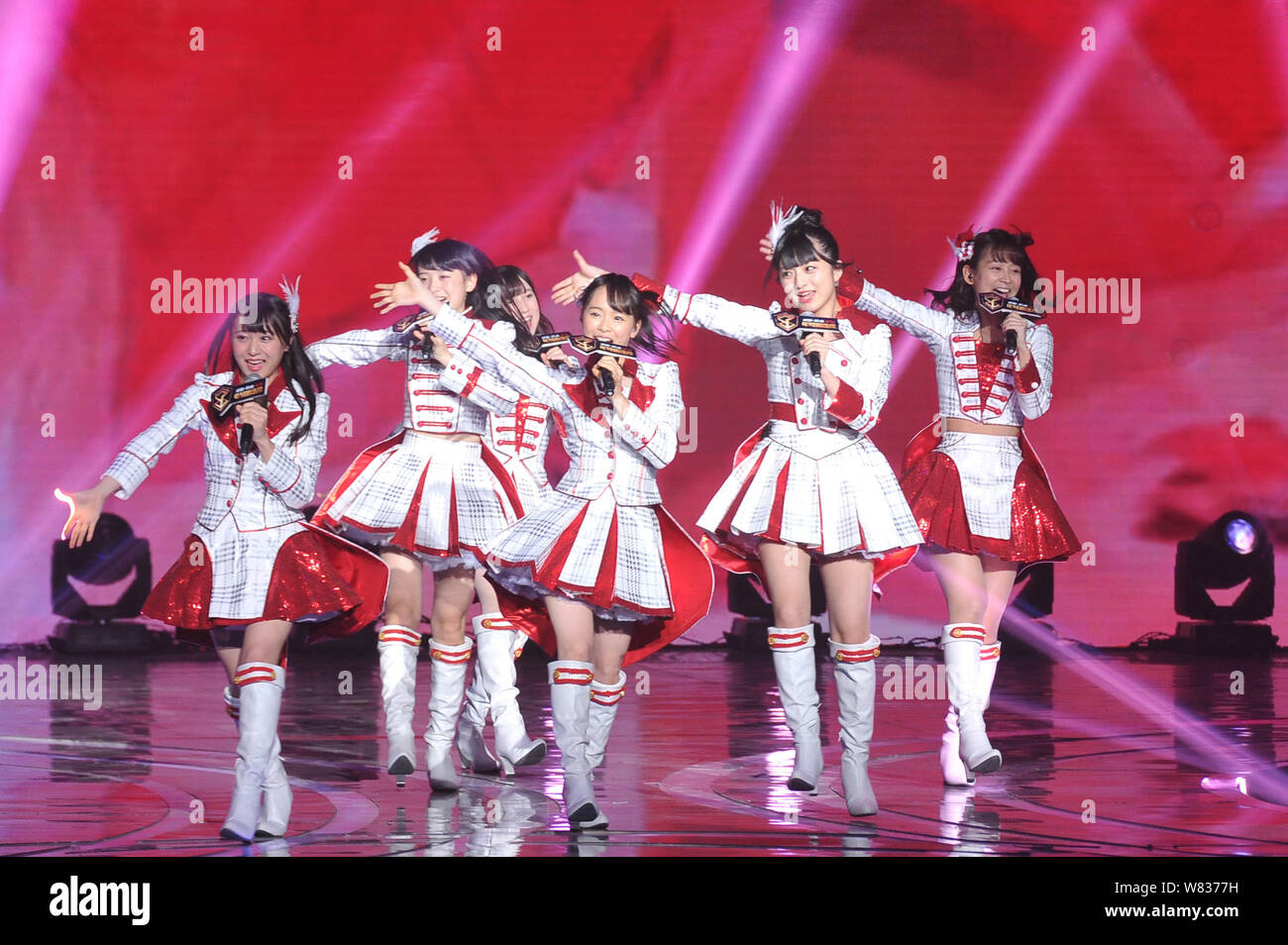 Members of Japanese girl group AKB48 Team8 perform during the 2016 ...