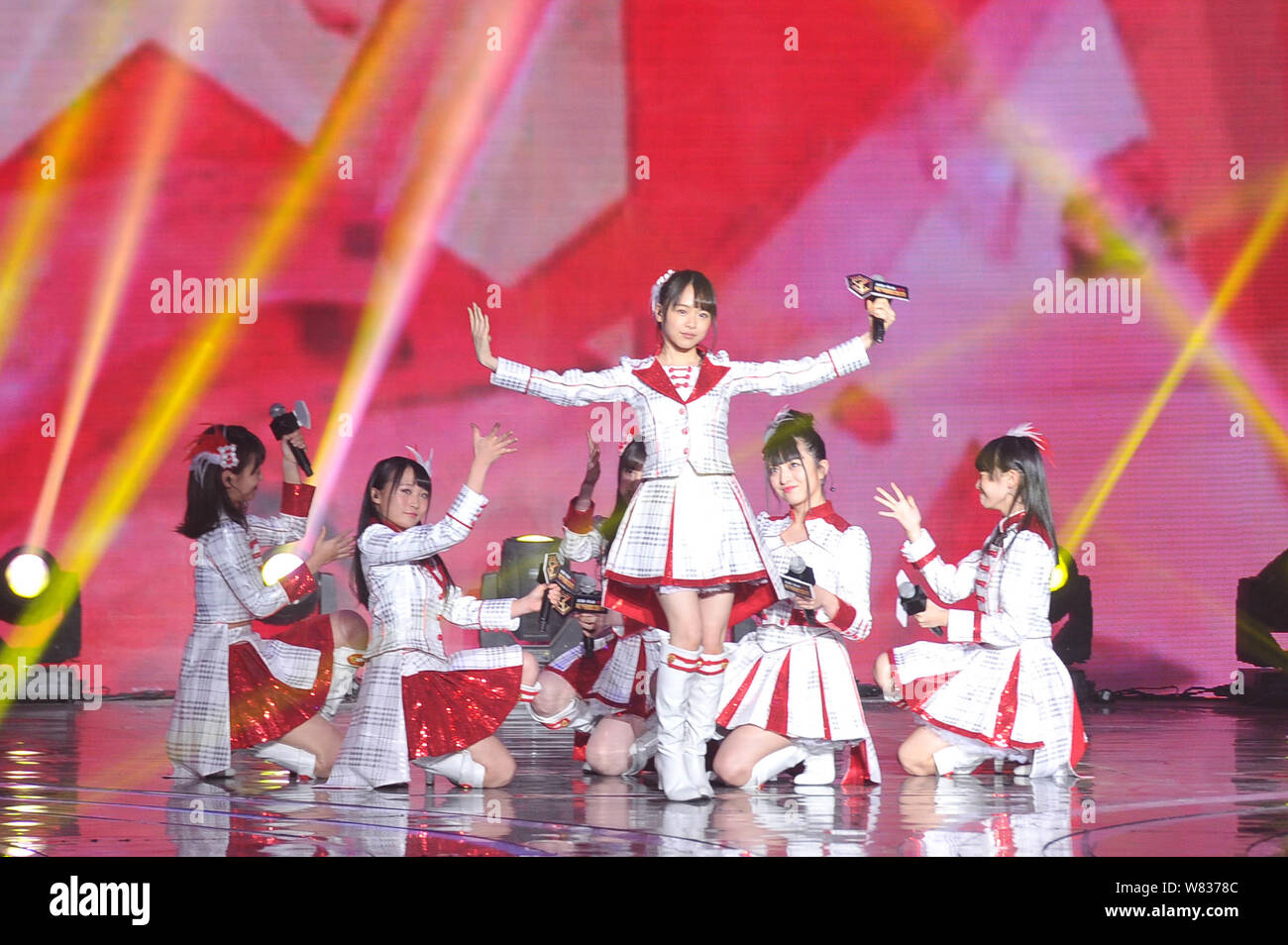 Members of Japanese girl group AKB48 Team8 perform during the 2016 ...