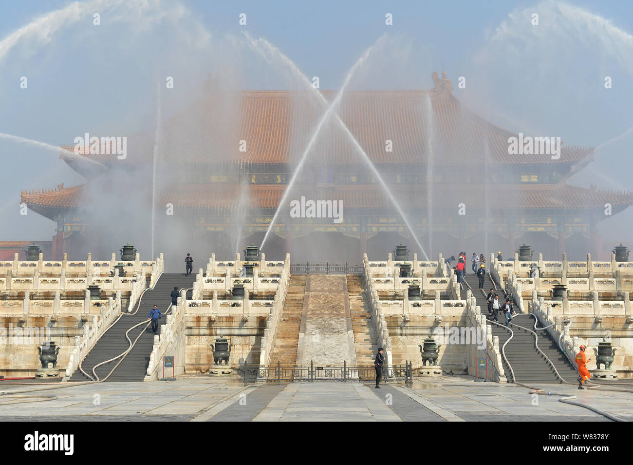 Chinese firefighters hose water onto the Hall of Supreme Harmony during ...