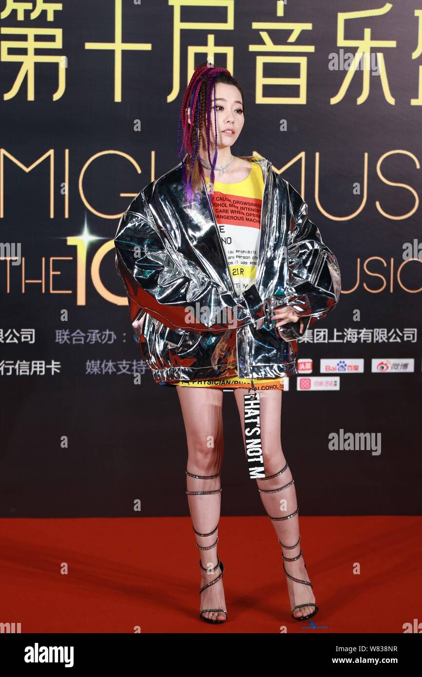 Chinese singer Jane Zhang or Zhang Liangying arrives on the red carpet ...