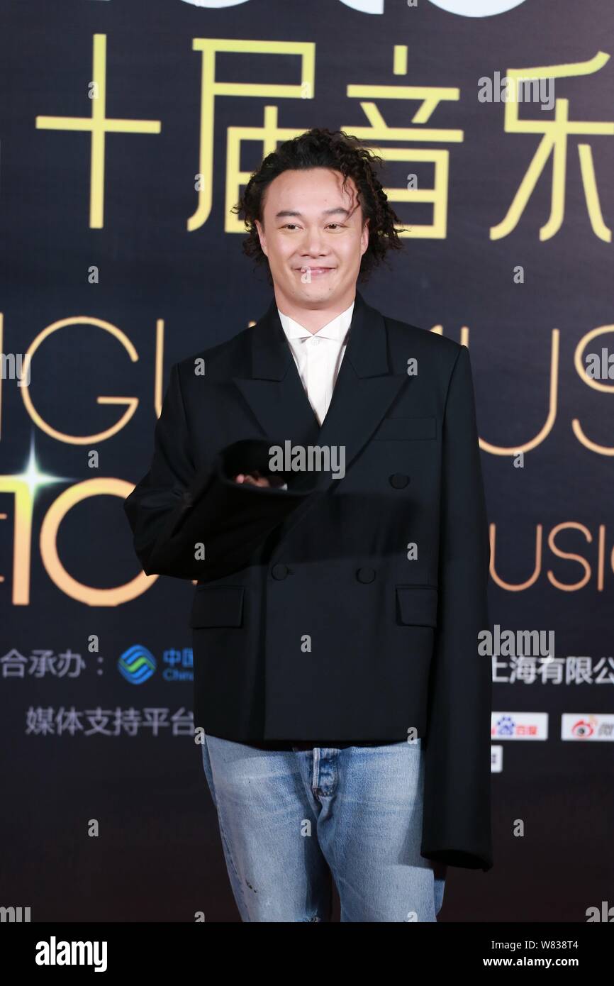 Hong Kong singer Eason Chan arrives on the red carpet for the 10th Migu ...
