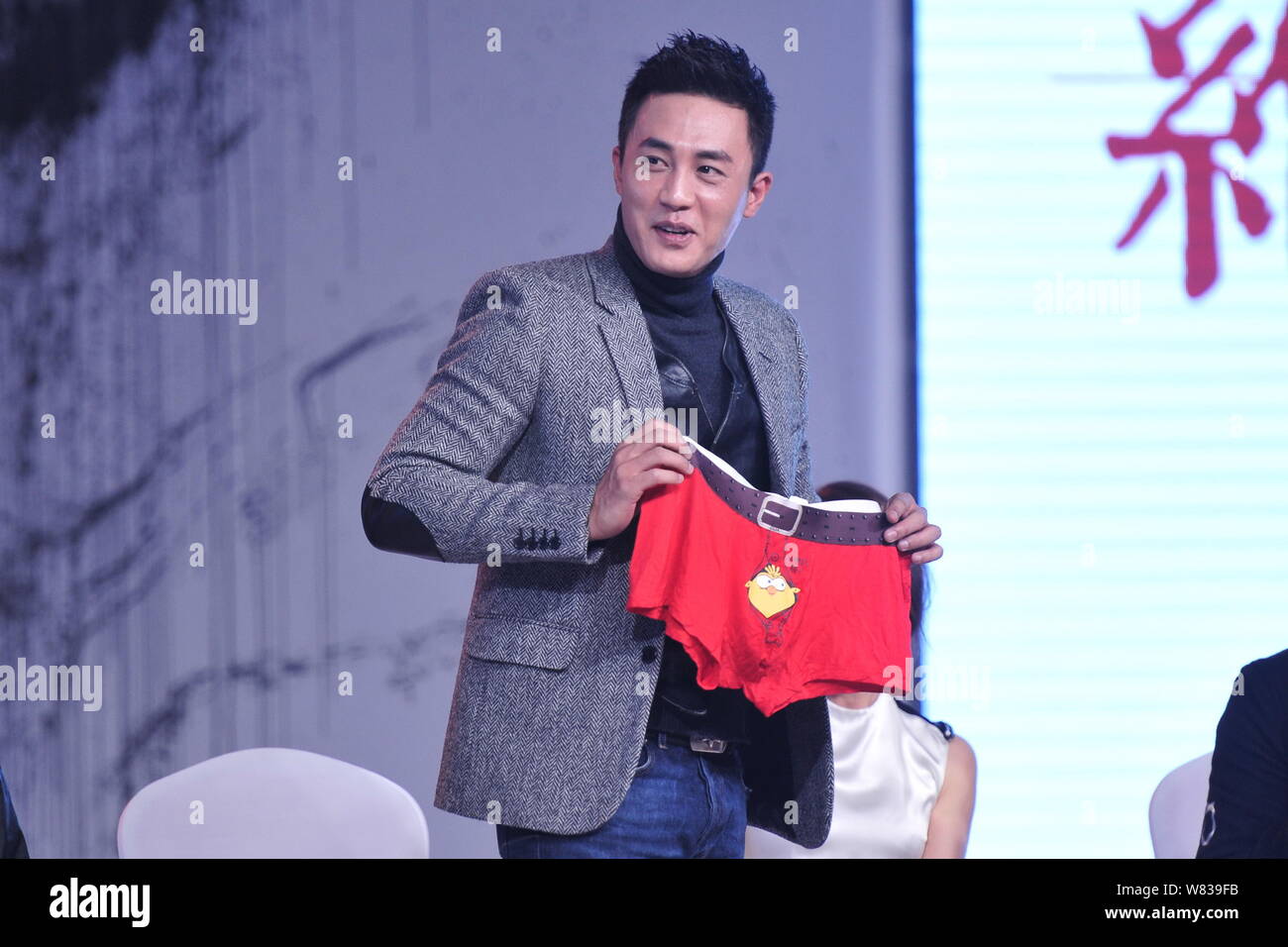 Chinese actor Du Chun attends a press conference to promote his new ...