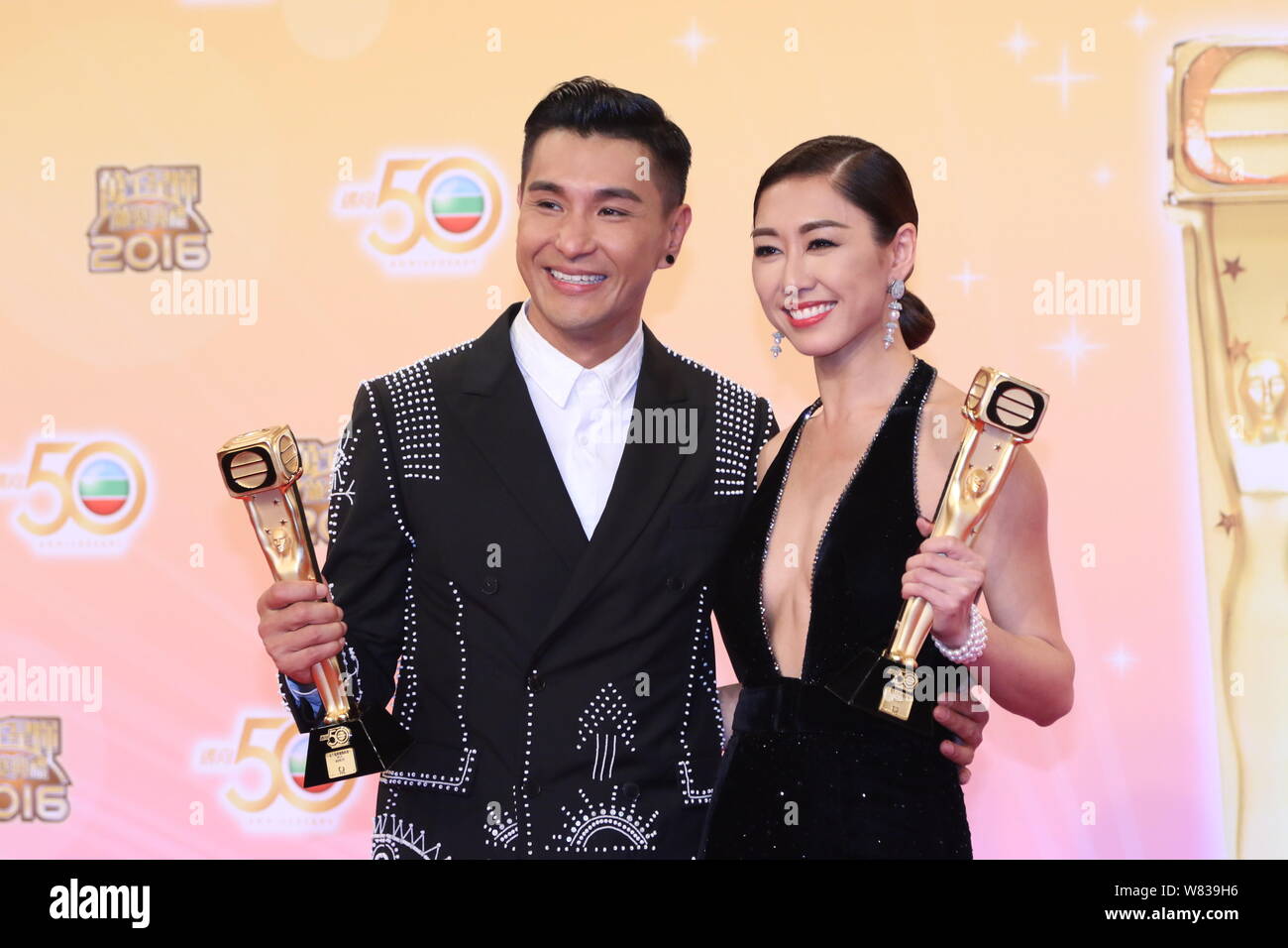 Hong Kong actress Nancy Wu, right, and actor Ruco Chan pose with their ...