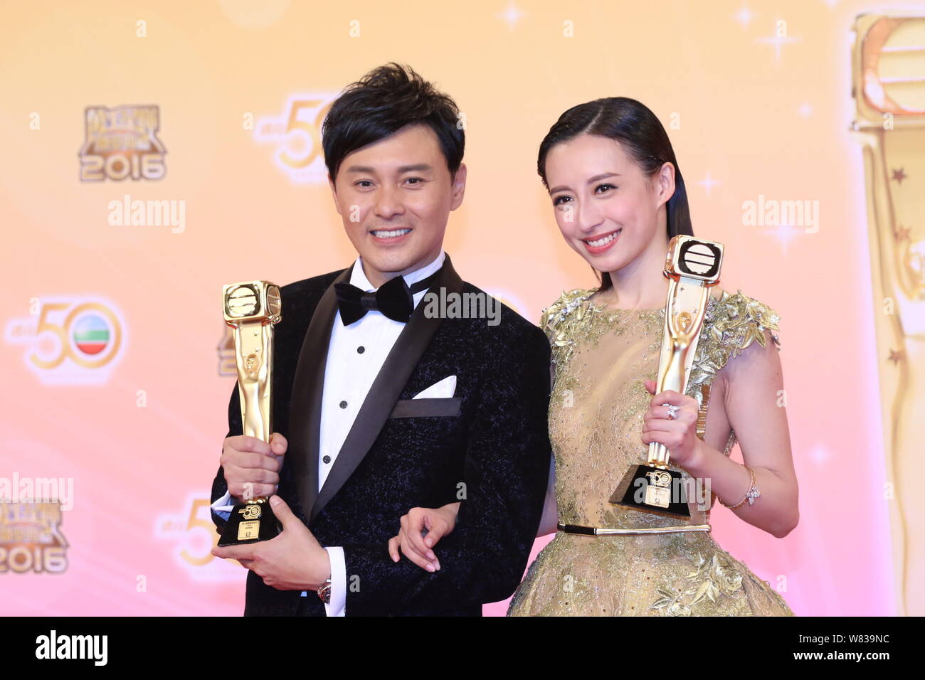 Hong Kong actress Katy Kung, right, and actor Raymond Cho pose with ...