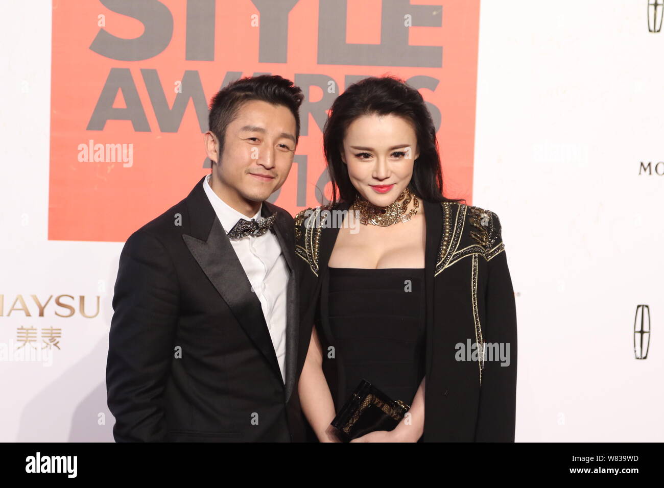 Chinese boxing star Zou Shiming, left, and his wife Ran Yingying arrive ...