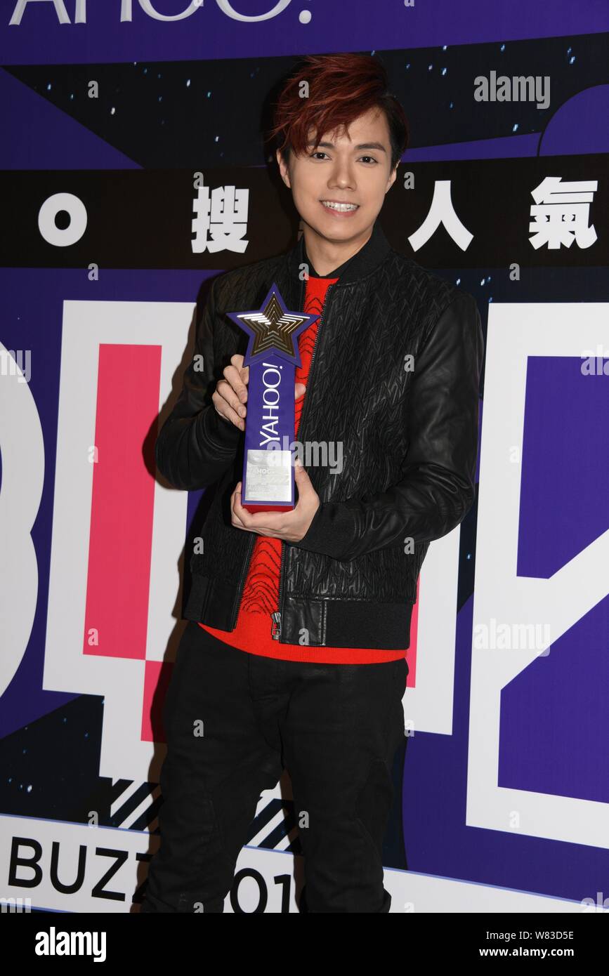 Hong Kong singer Hins Cheung poses with his trophy during the ...