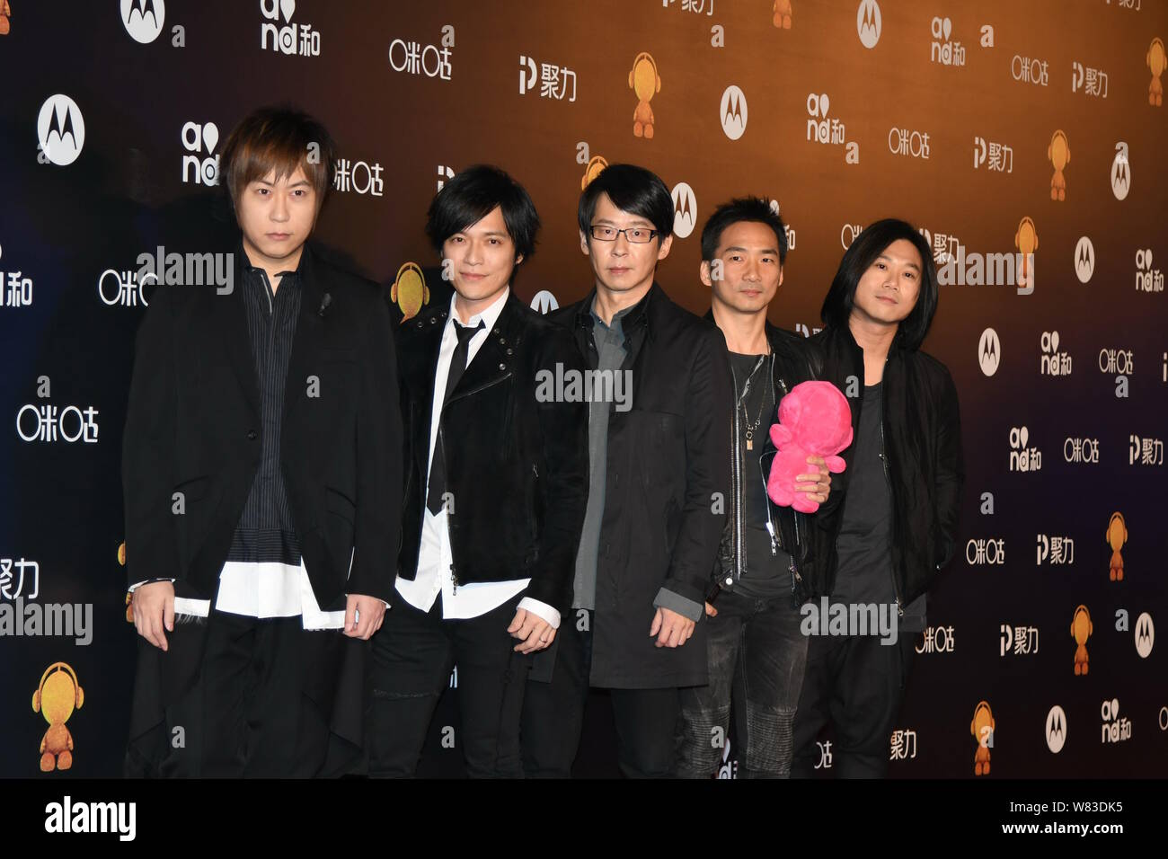 Members of Taiwanese band Mayday arrive on the red carpet for the 10th ...