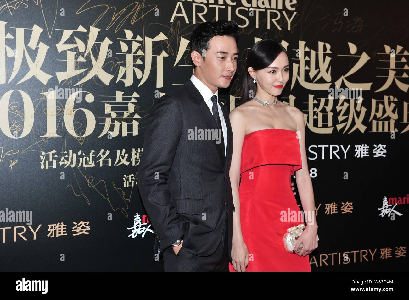 Chinese actor Luo Jin, left, and his actress girlfriend Tang Yan arrive on the red carpet for ...