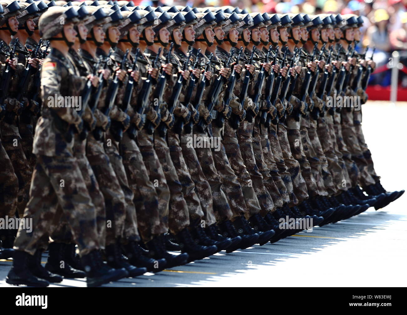 --FILE--Chinese PLA (People's Liberation Army) soldiers march past the ...