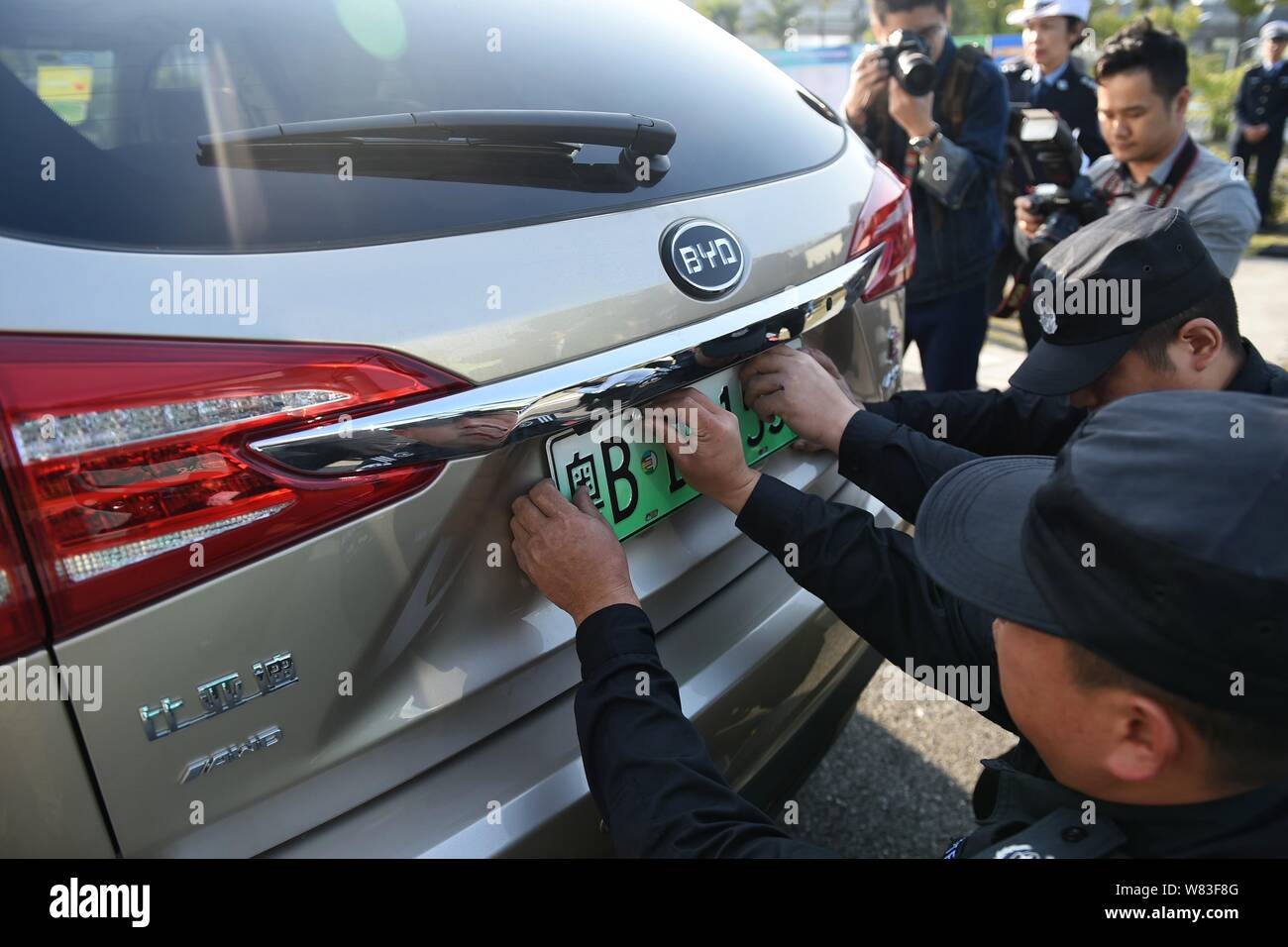 Chinese employees of the local vehicle administration department ...