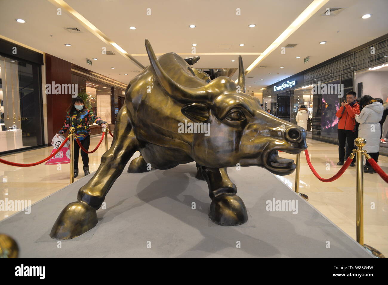 A bull sculpture is pictured at Seasons Place mall in Beijing, China ...