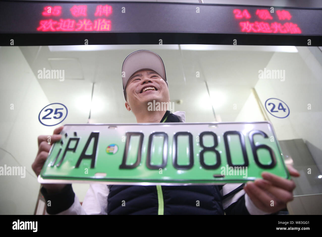 The owner of a Tesla Model X electric SUV shows his new energy vehicle ...