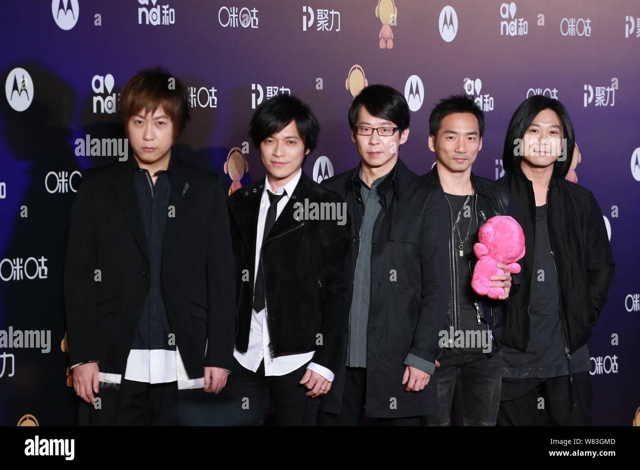 Members of Taiwanese band Mayday arrive on the red carpet for the 10th ...