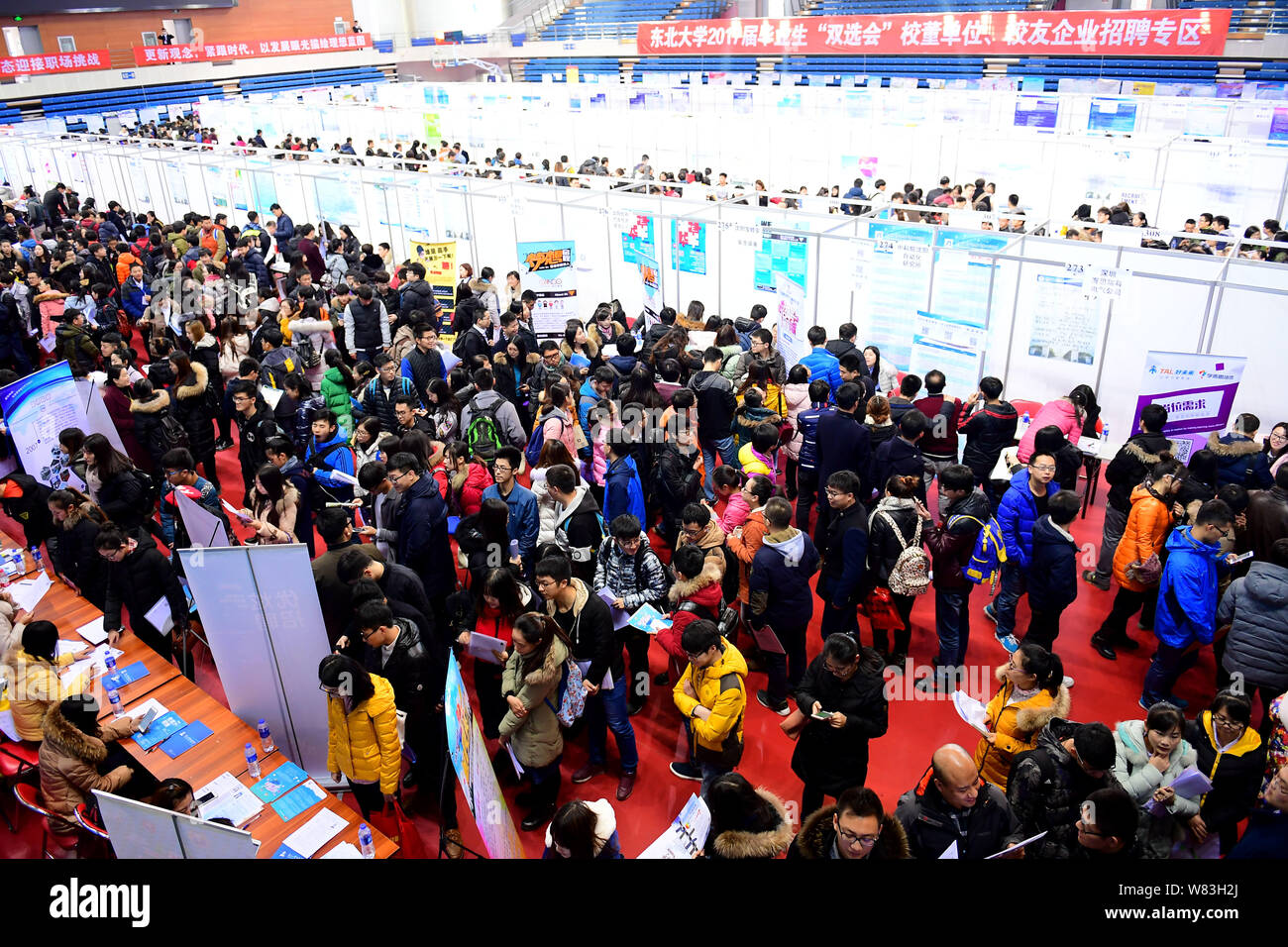 --FILE--Chinese graduates crowd booths to seek for employments during a ...
