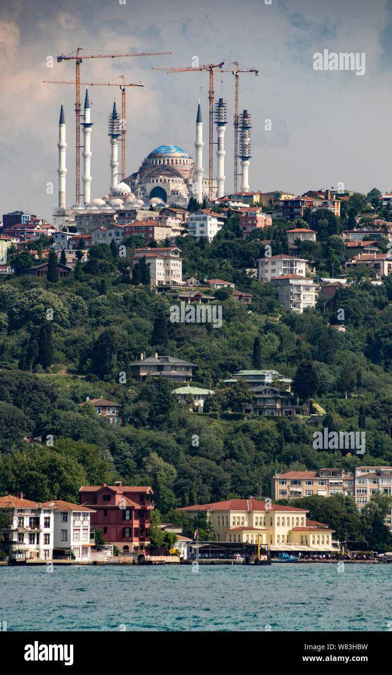 Construction cranes can be seen as mosque is being restored in Istanbul ...