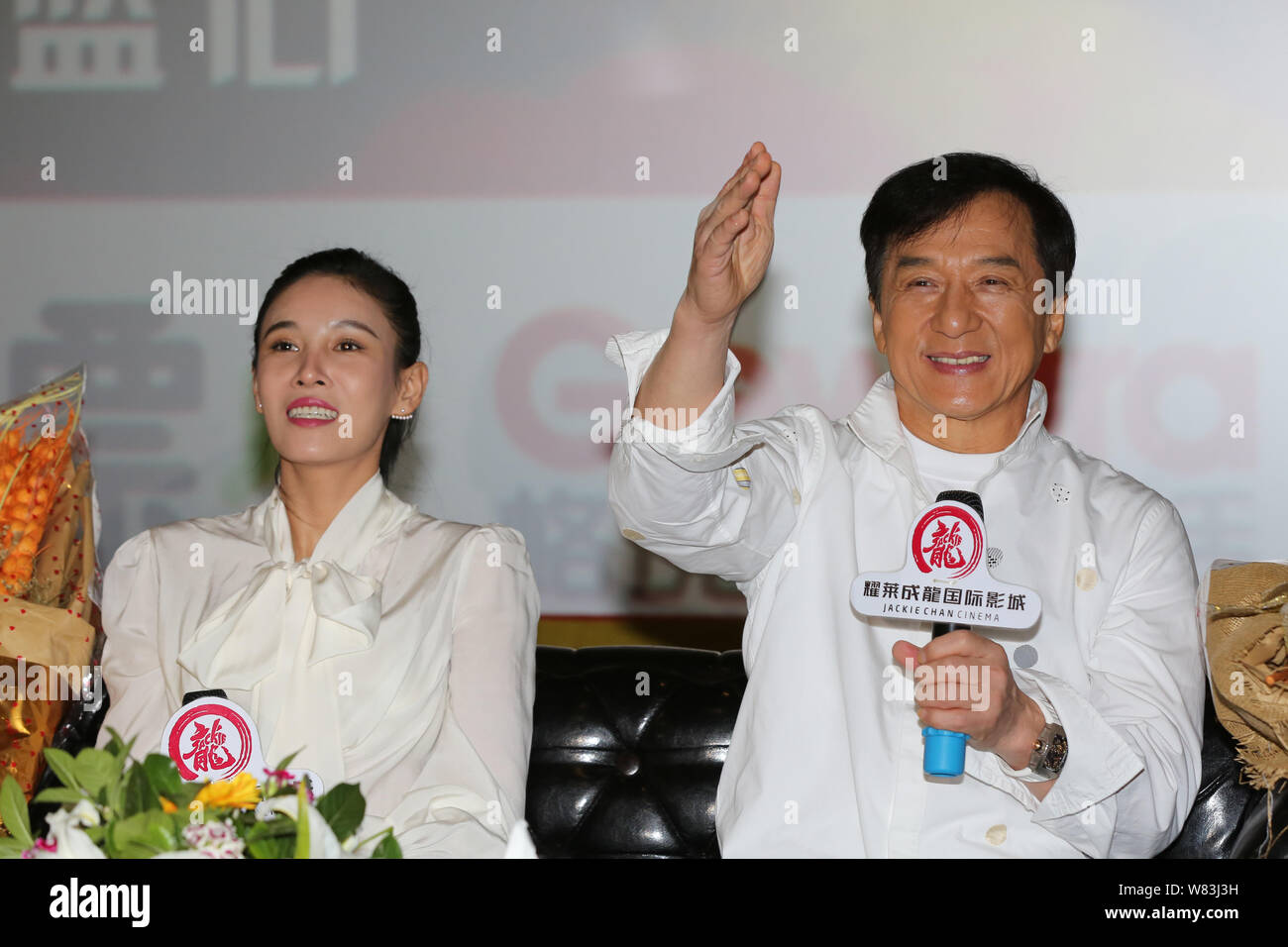 Hong Kong kungfu superstar Jackie Chan, right, and Chinese actress Zhang Lanxin attend a ...